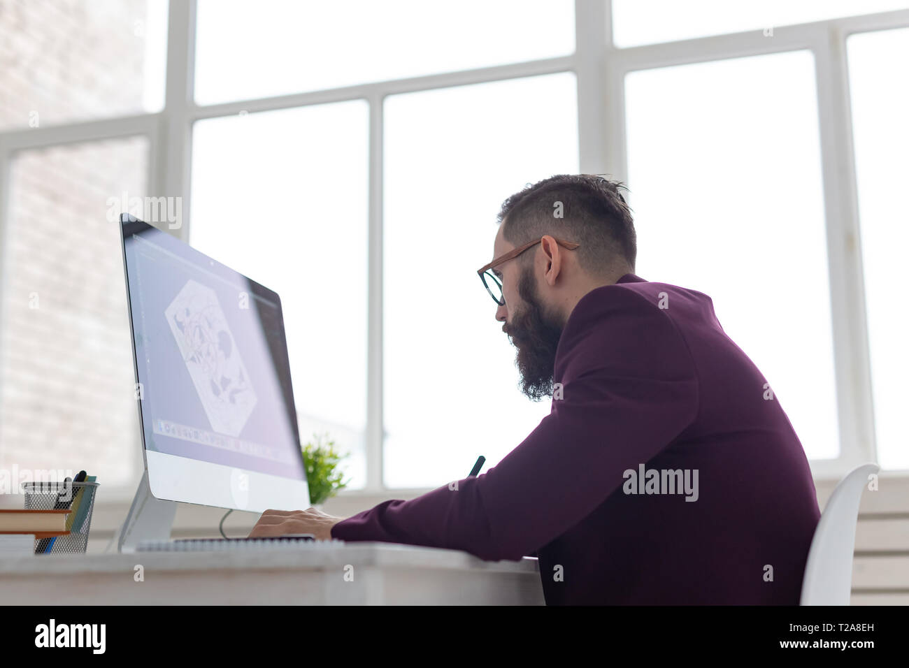 people, design and style concept - graphic designer sketching new ...