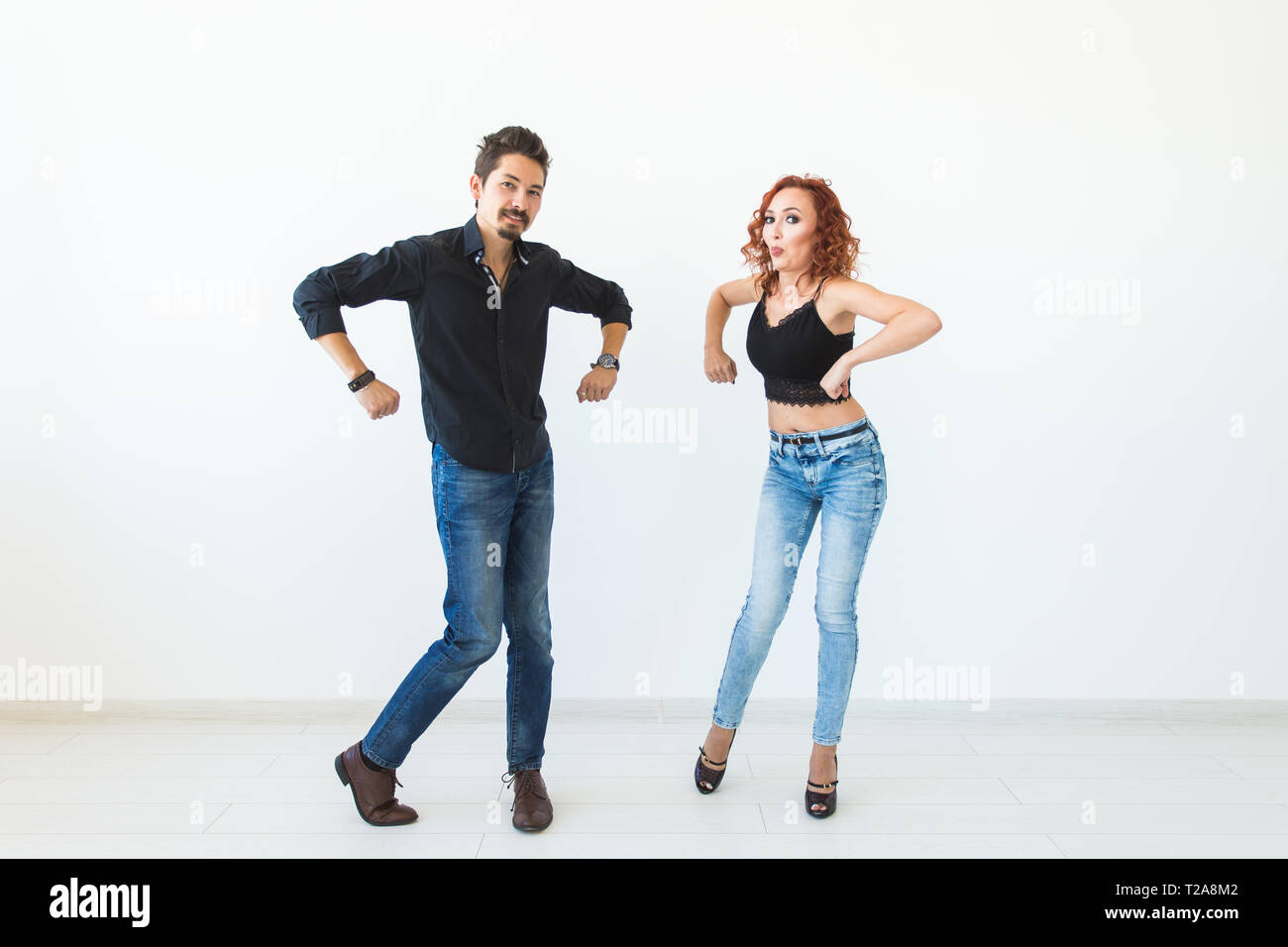 Social dance concept - Crazy dancing, cheerful couple over white ...