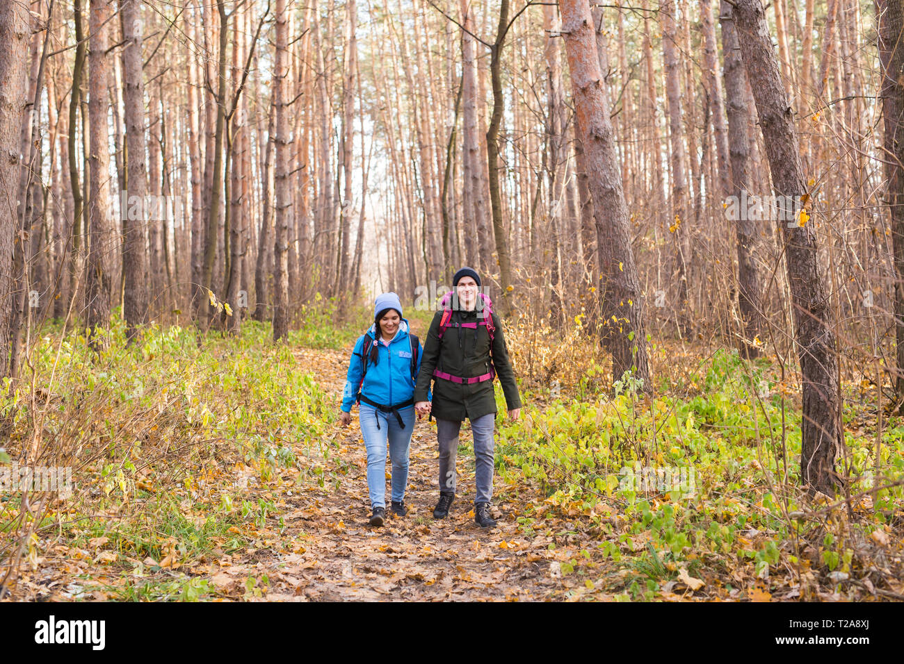 adventure, travel, tourism, hike and people concept - smiling couple ...