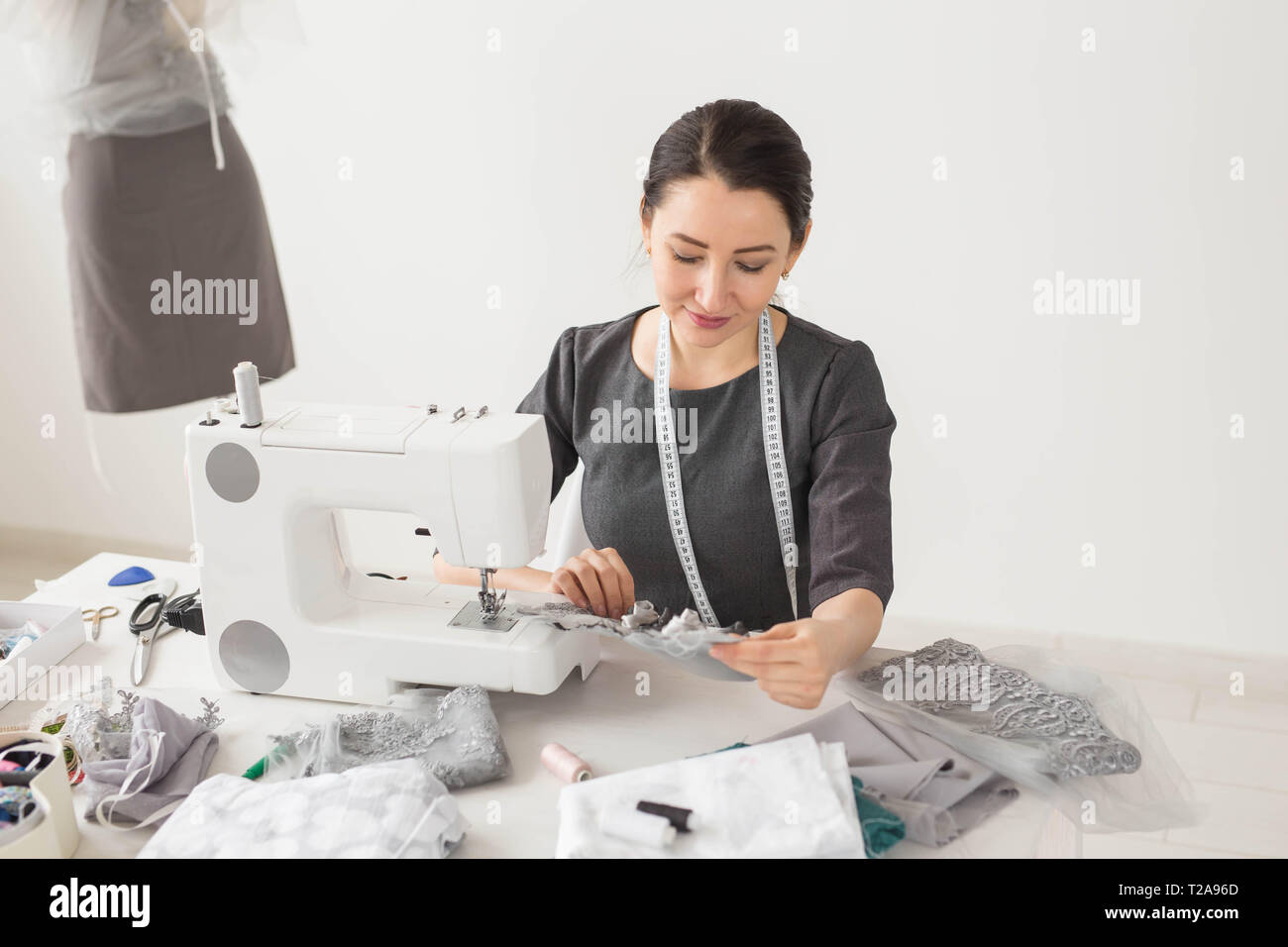 People, tailor and creative concept - Portrait of fashion designer with ...