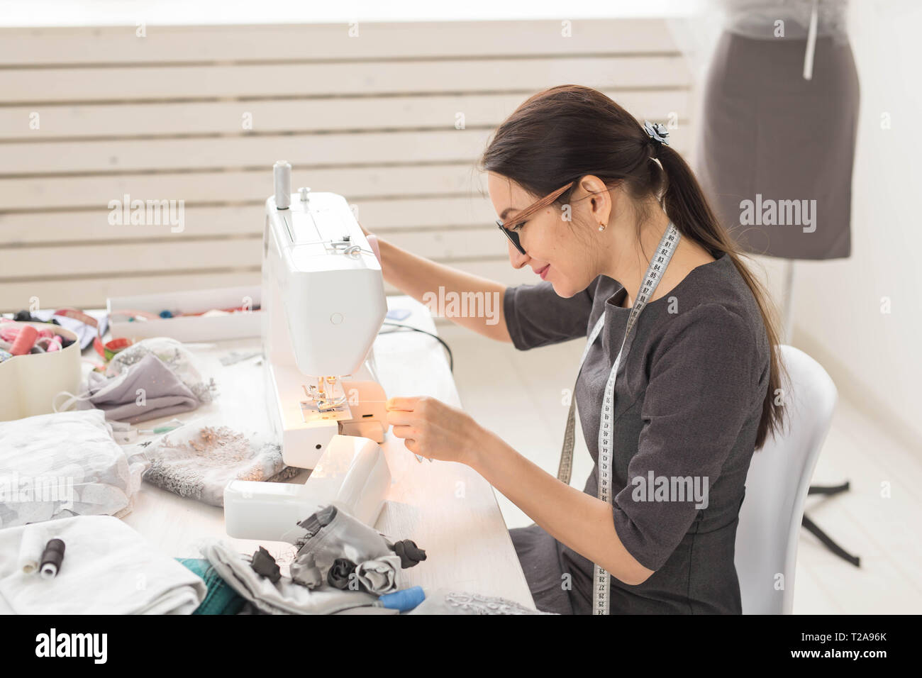 People, tailor and creative concept - Portrait of fashion designer with ...