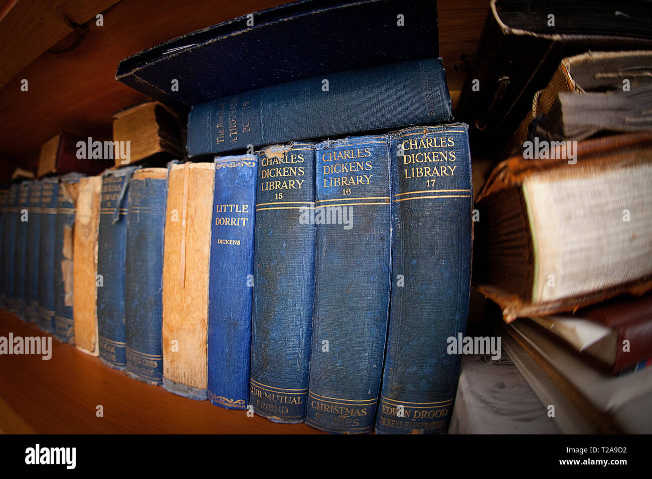 Old Books including a collection of Charles Dickens Stock Photo - Alamy