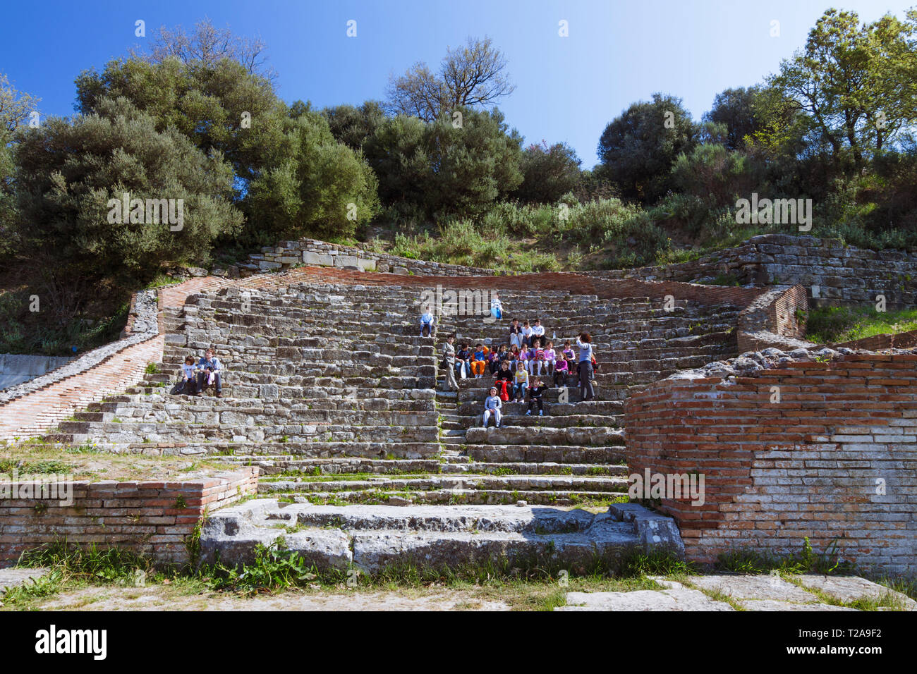 Apollonia, Fier, Albania : A group of teenagers stand at the ruins of ...