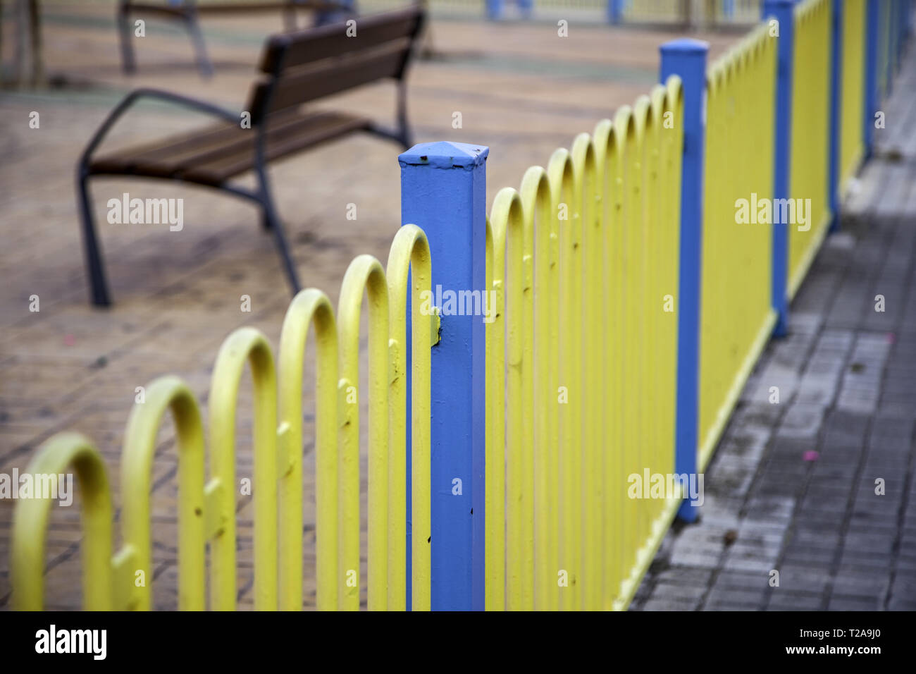 Yellow guardrail for protection, security detail Stock Photo - Alamy