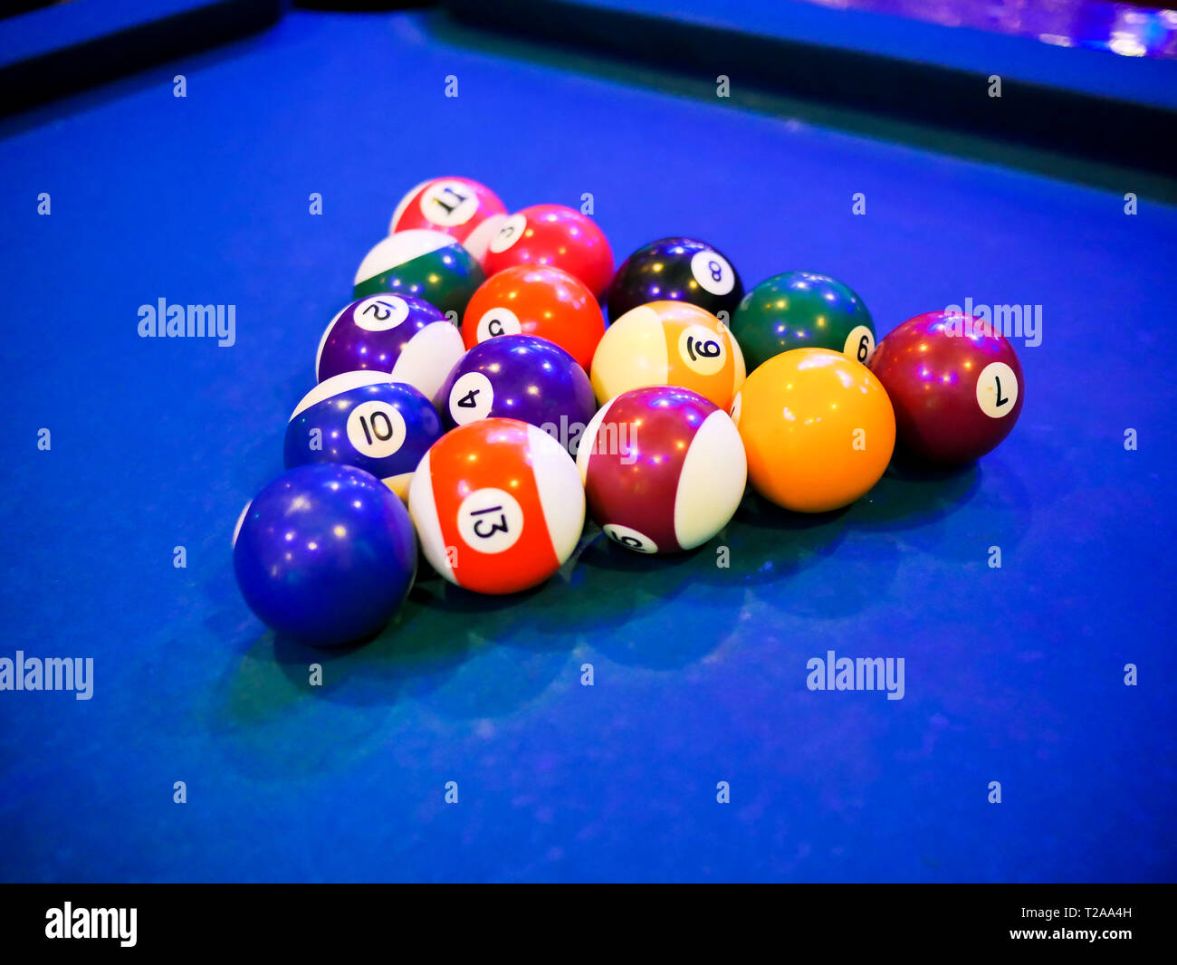 Billiards ball on pool blue table Stock Photo - Alamy