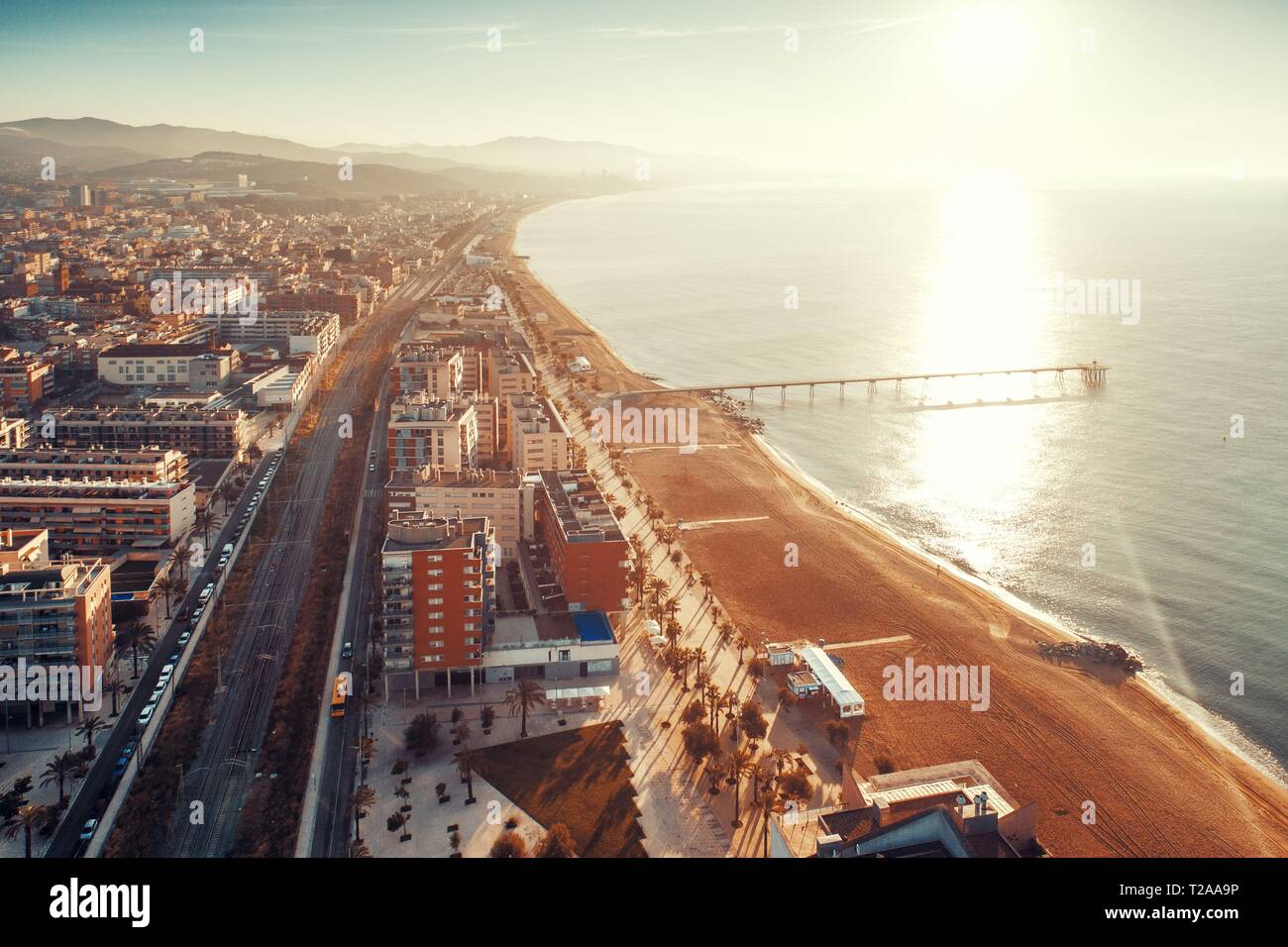 Barcelona coast pier aerial view in Spain at sunrise Stock Photo - Alamy
