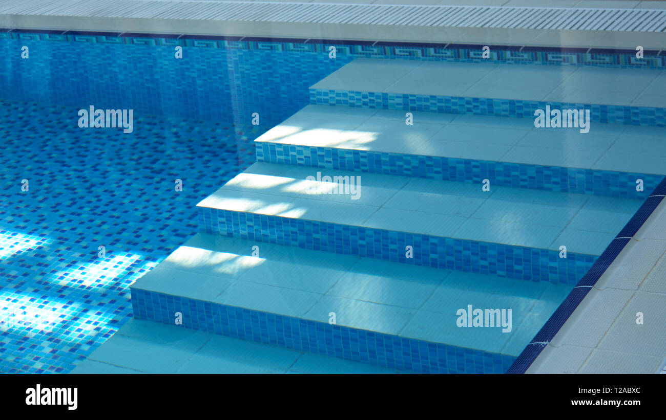 Background with stairs to swimming pool Stock Photo - Alamy