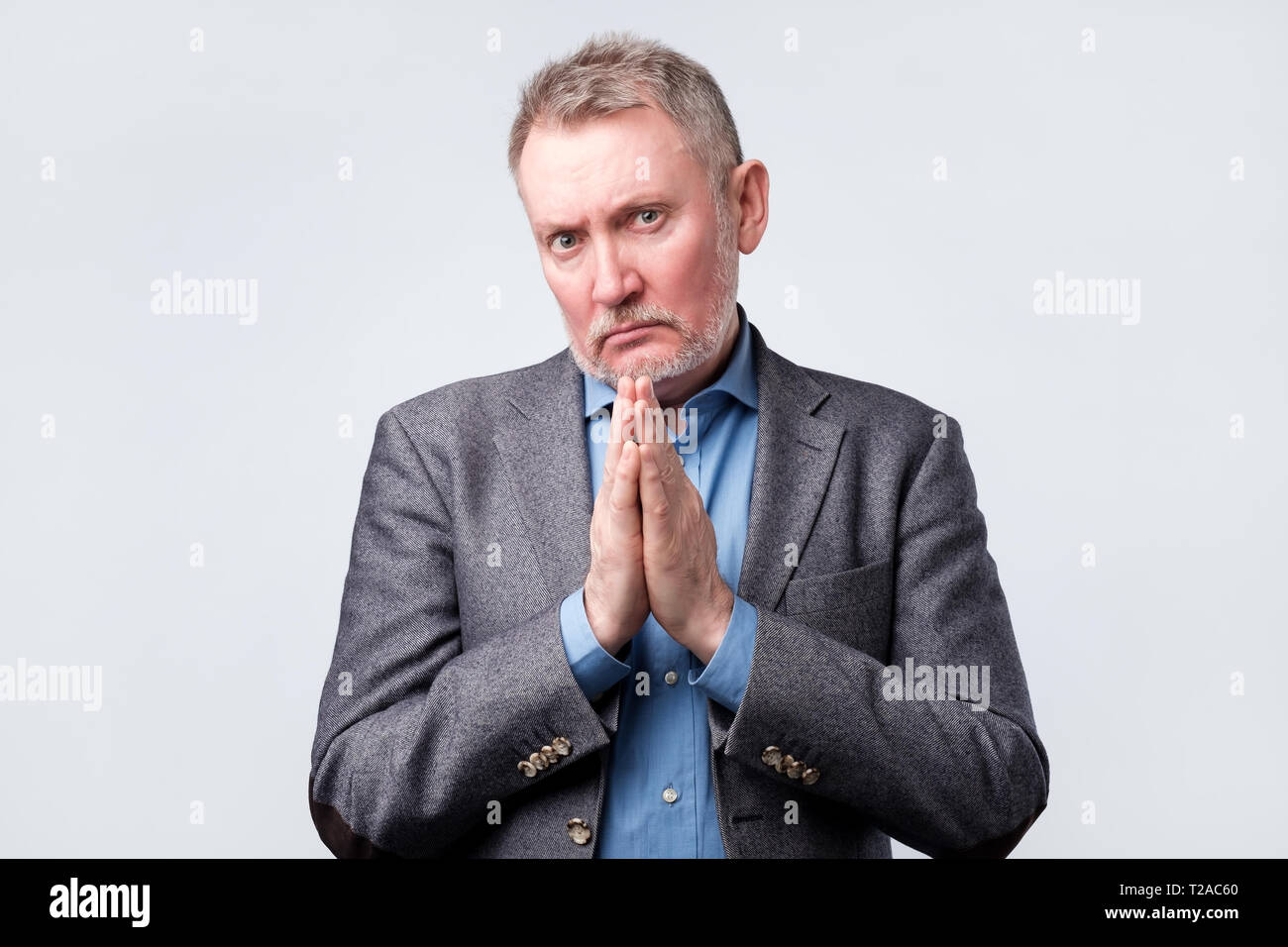 Pleasing expression hi-res stock photography and images - Alamy