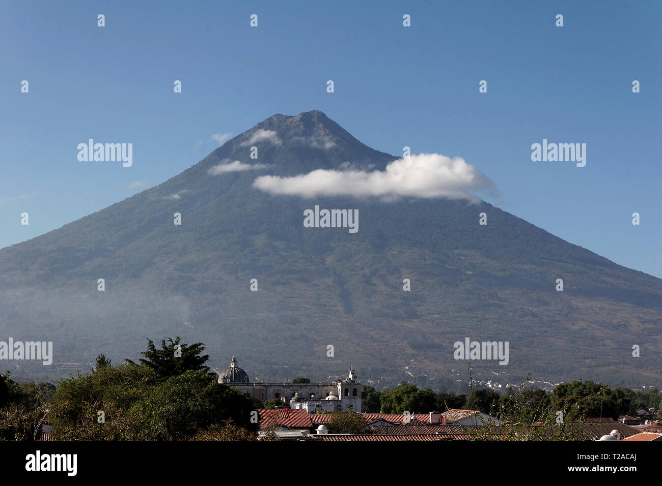 The Agua Volcano, a prominent stratovolcano visible throughout the city ...