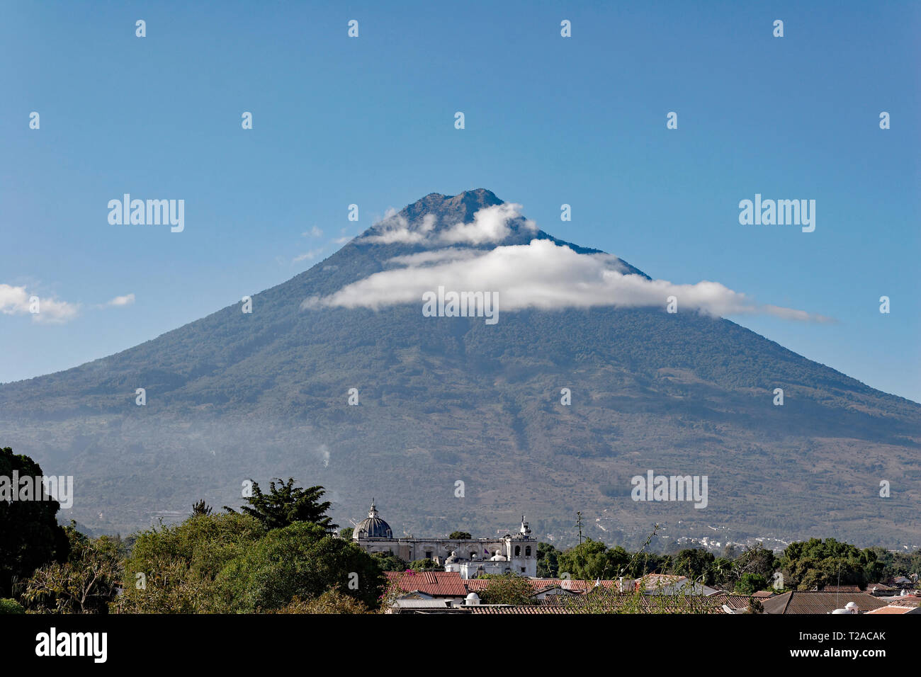 The Agua Volcano, a prominent stratovolcano visible throughout the city ...