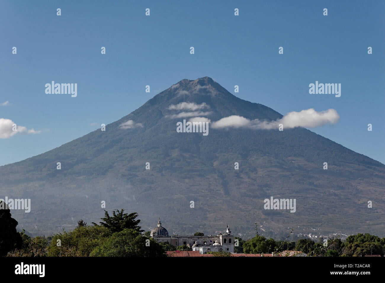 The Agua Volcano, a prominent stratovolcano visible throughout the city ...