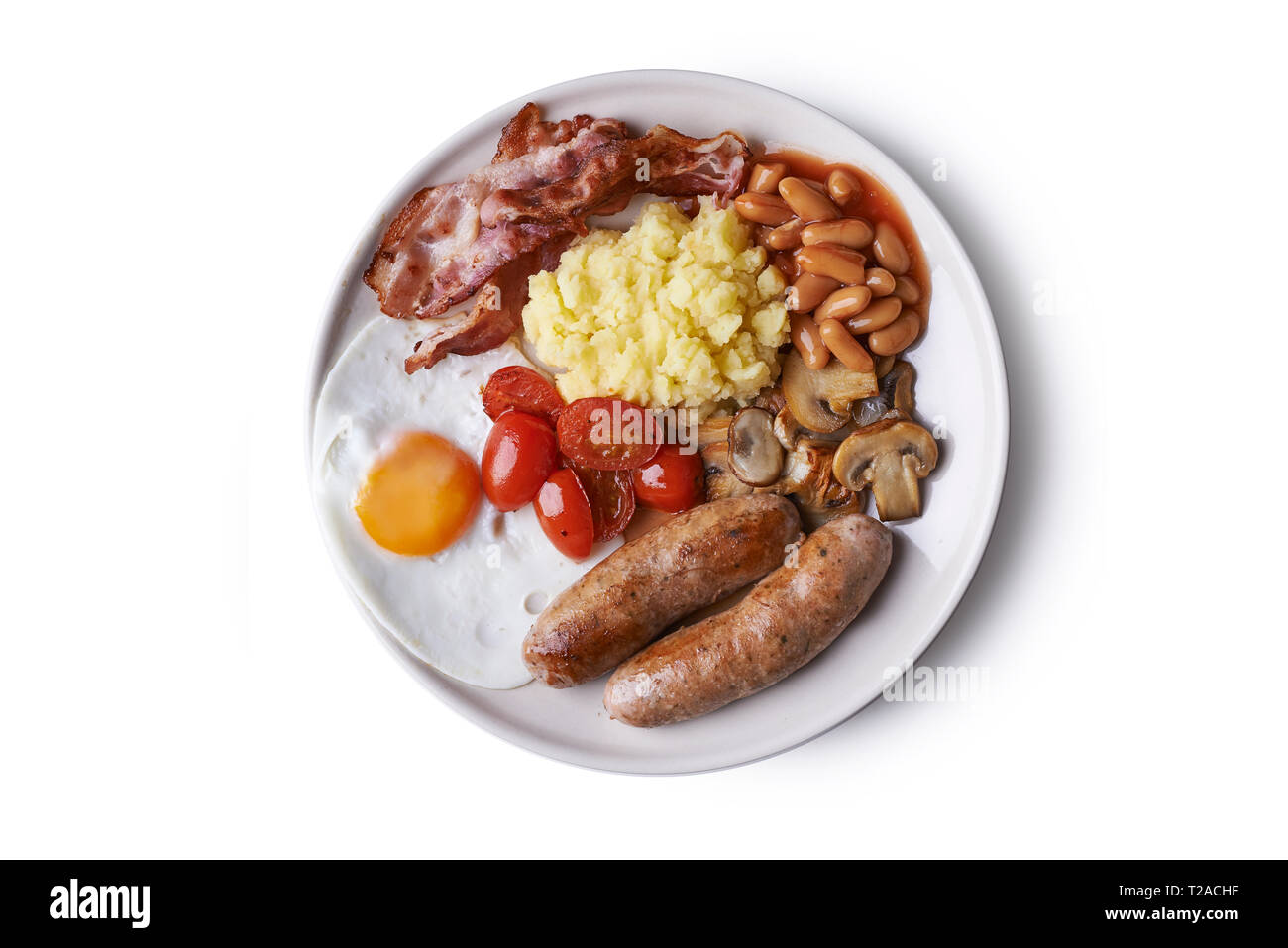 full english breakfast with eggs, sausages, potato, beans, bacon ...