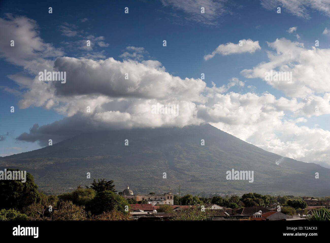 The Agua Volcano, a prominent stratovolcano visible throughout the city ...