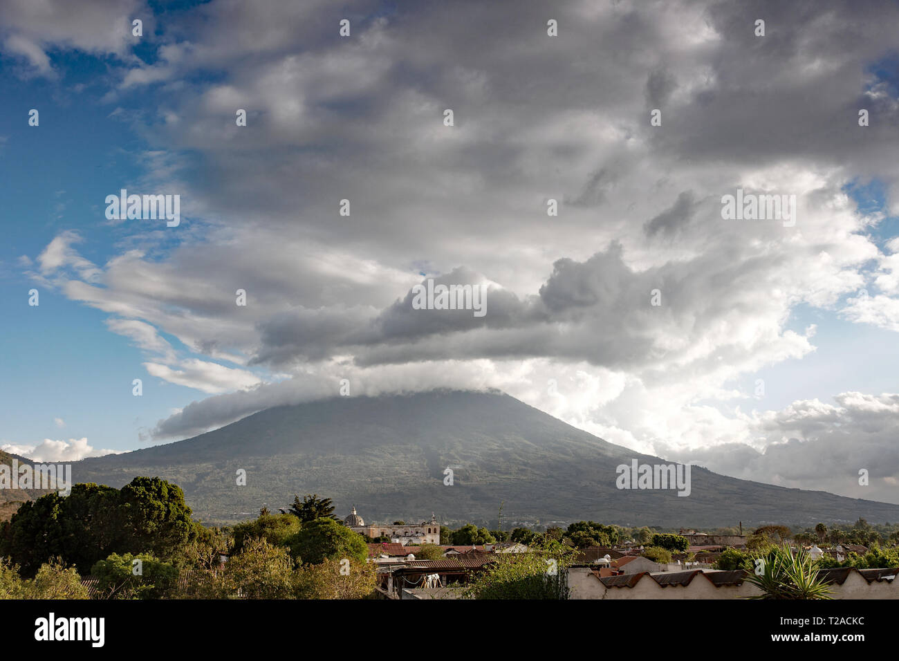The Agua Volcano, a prominent stratovolcano visible throughout the city ...