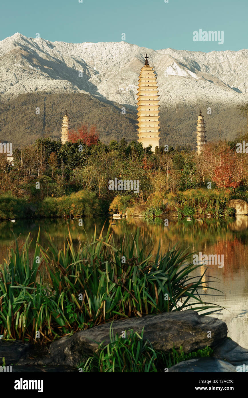 Ancient pagoda in Dali old town with snow capped Mt Cangshan, Yunnan ...