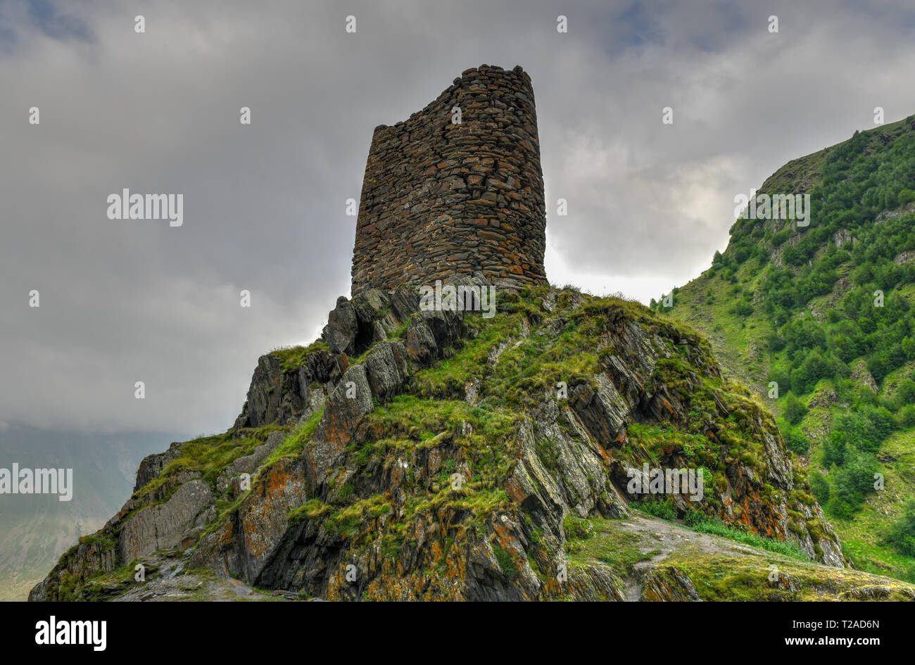 Hilly landscape near the village of Gergeti in Georgia, under Mount ...