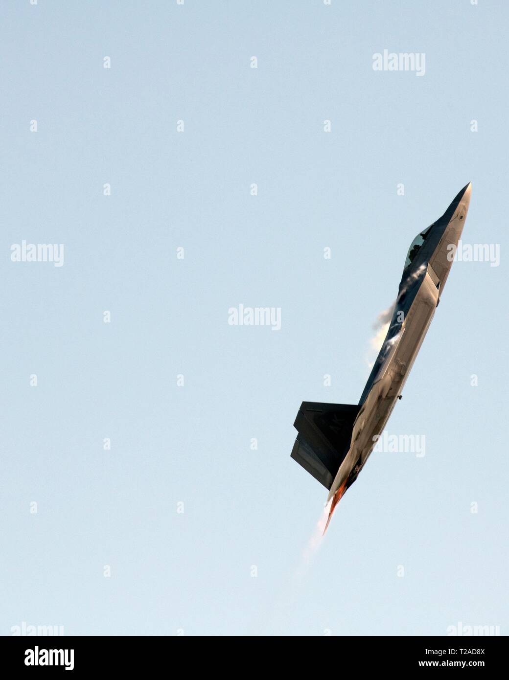 A U.S. Air Force F-22 Raptor stealth fighter aircraft performs aerial ...