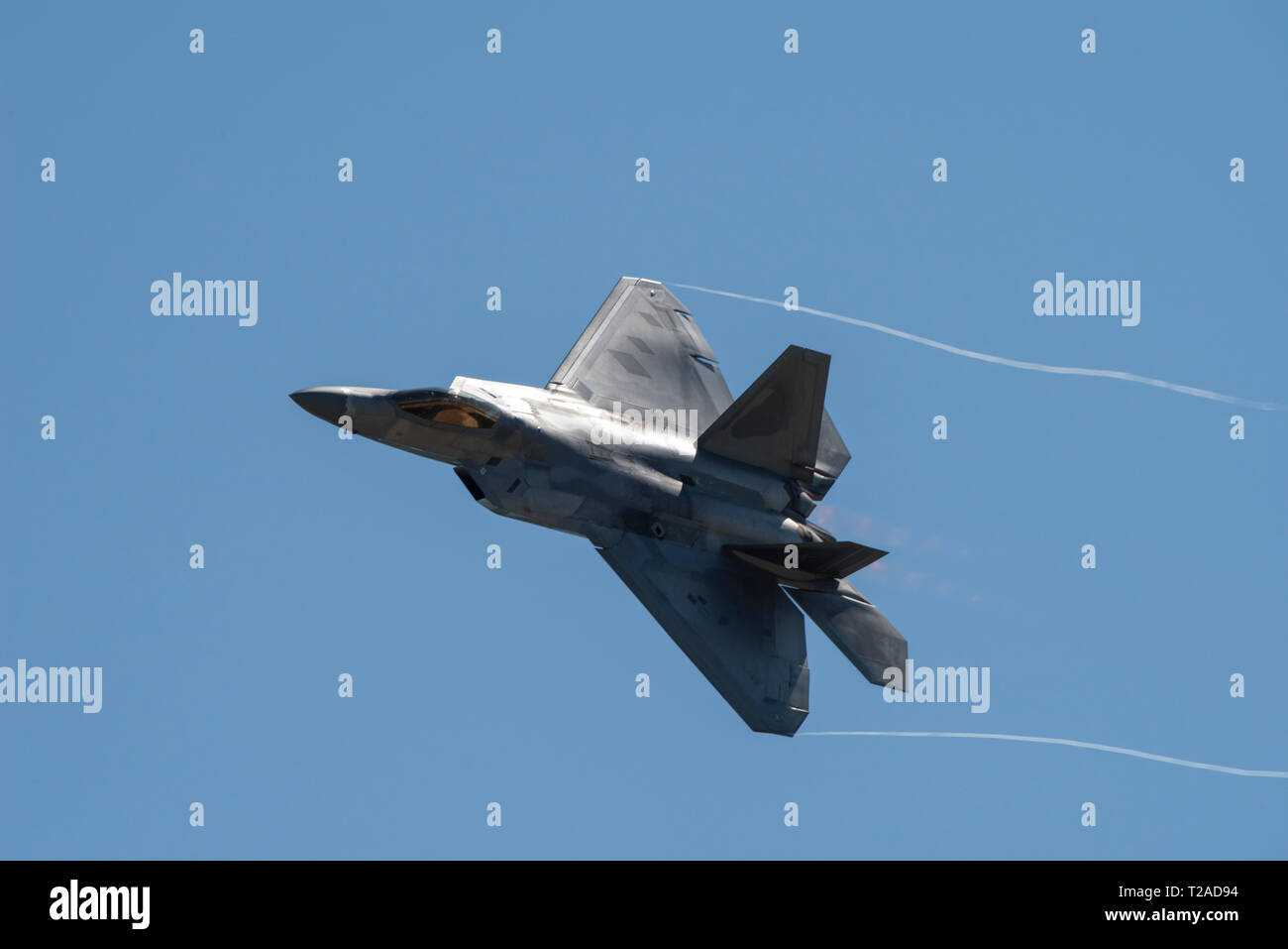 A U.S. Air Force F-22 Raptor stealth fighter aircraft performs aerial ...