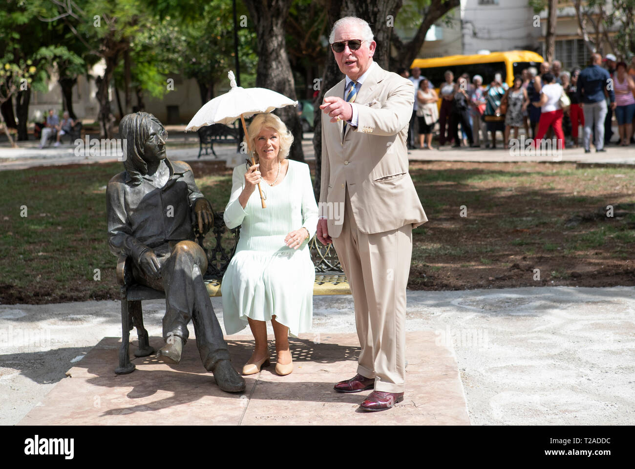 The Prince of Wales and the Duchess of Cornwall sit on the John Lennon ...