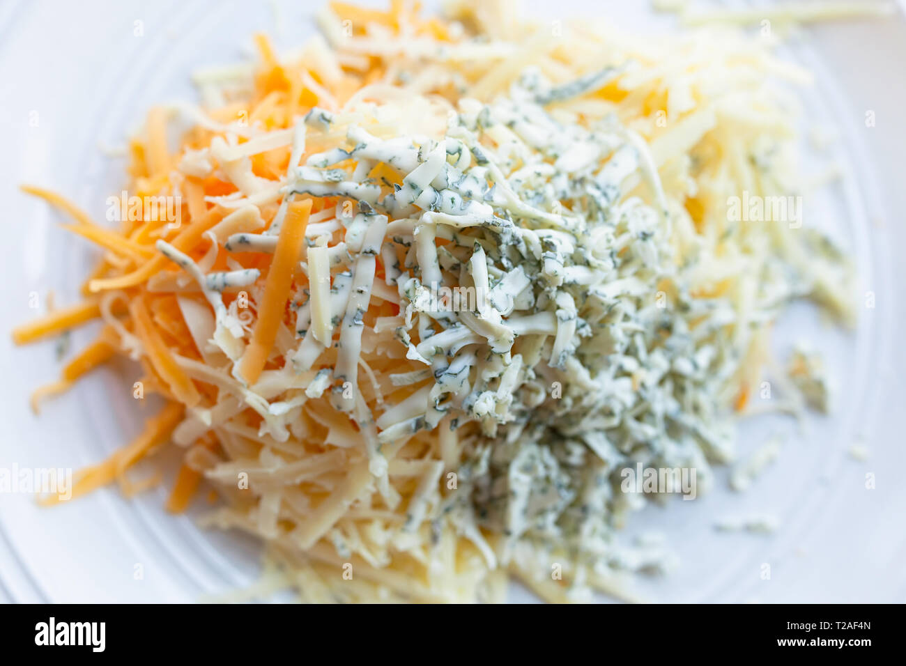 Dairy protein grated cheddar cheese hi-res stock photography and images ...