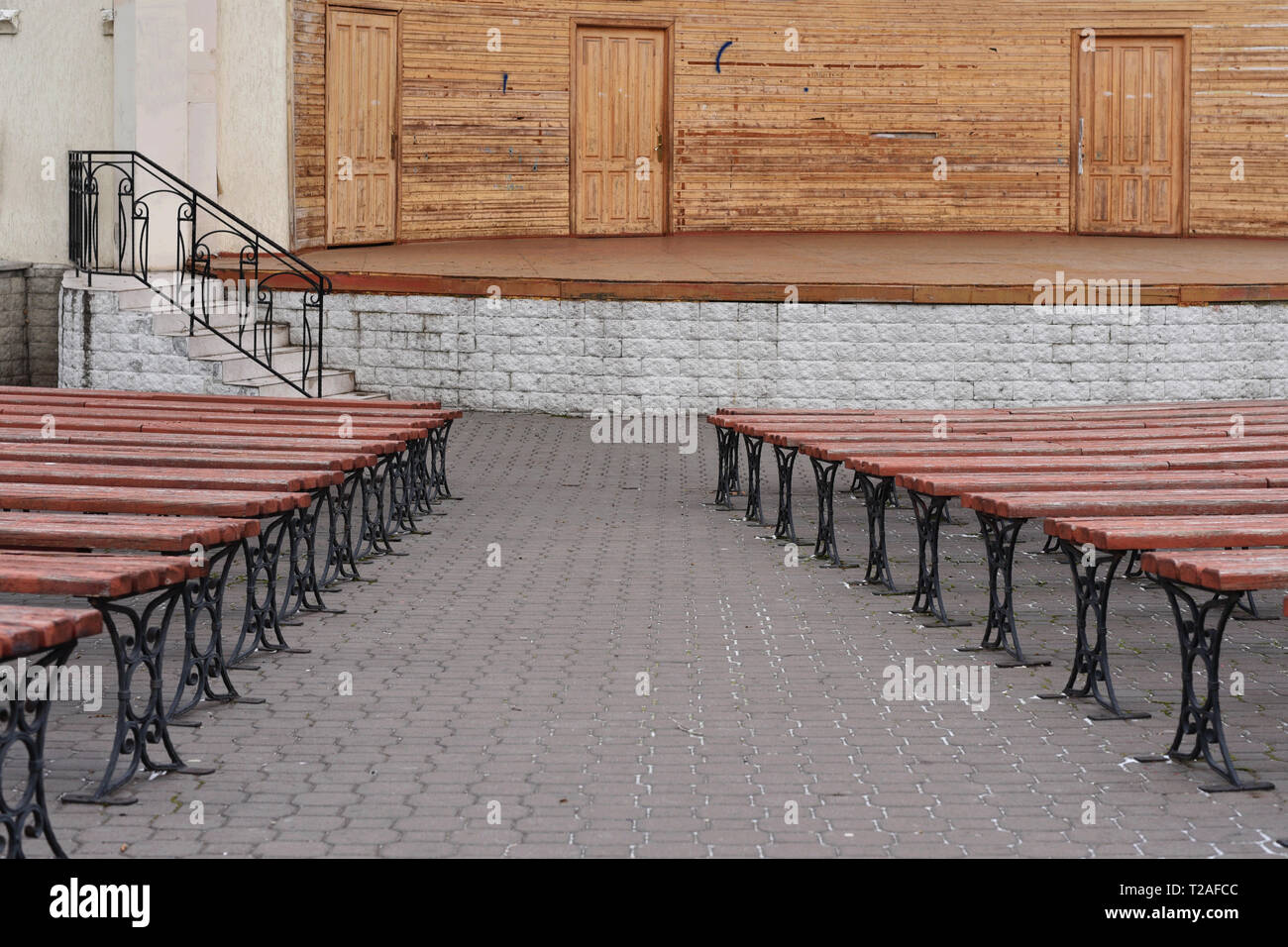 photograph of benches located in the future. benches are made of wood ...