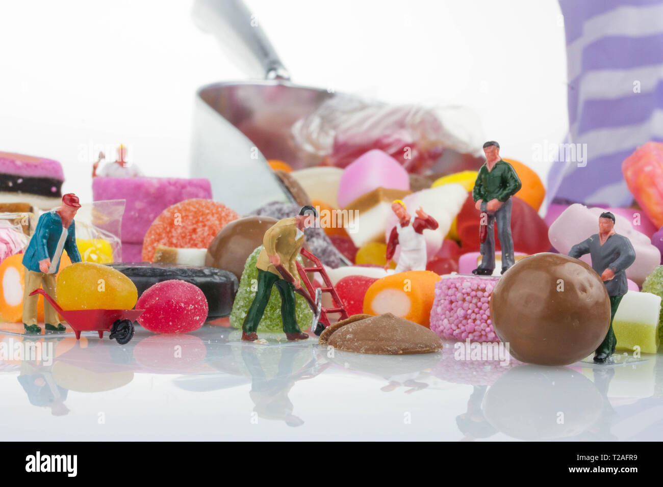 Miniature people - Sweet selection Stock Photo - Alamy