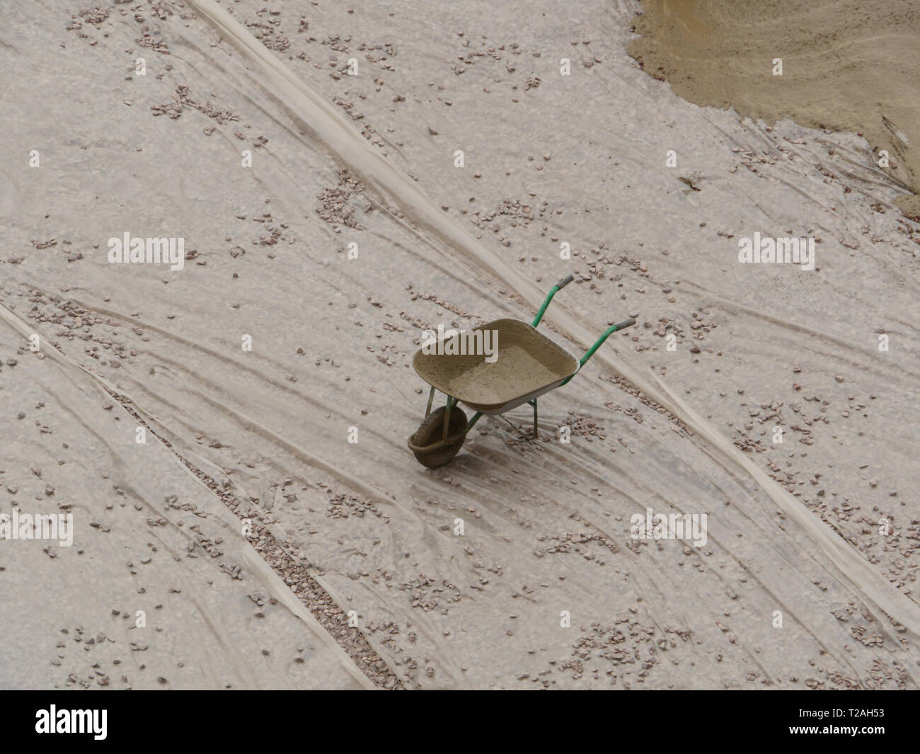one empty wheelbarrow at a construction site Stock Photo - Alamy