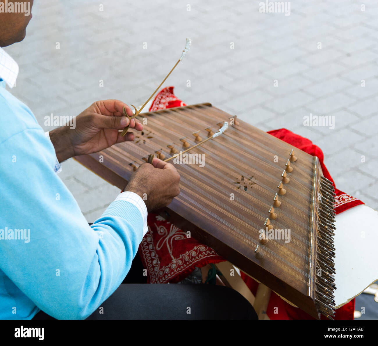 Santur is a percussion instrument of Persian / Iranic origin. played ...