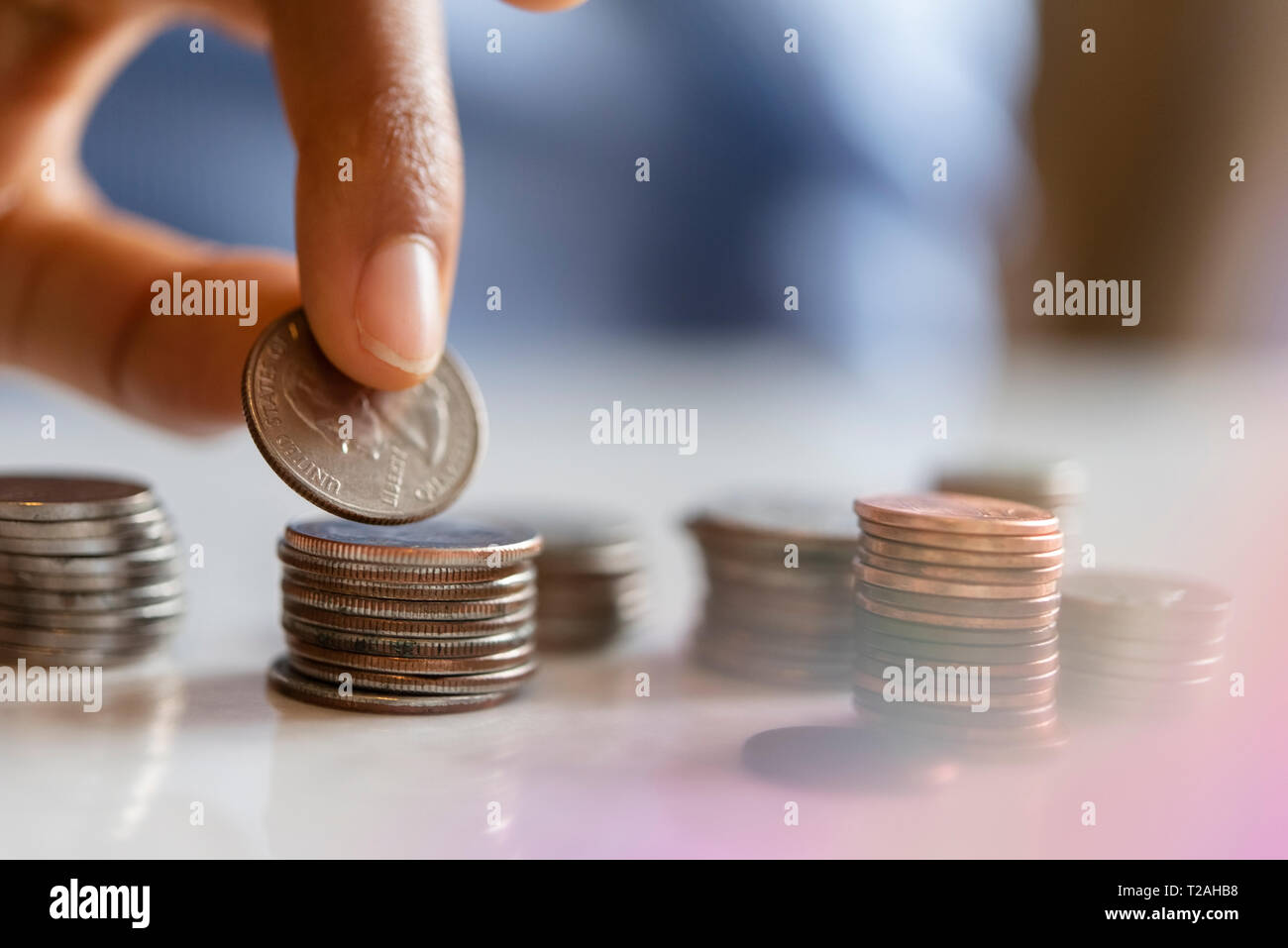Stacking coins african hi-res stock photography and images - Alamy
