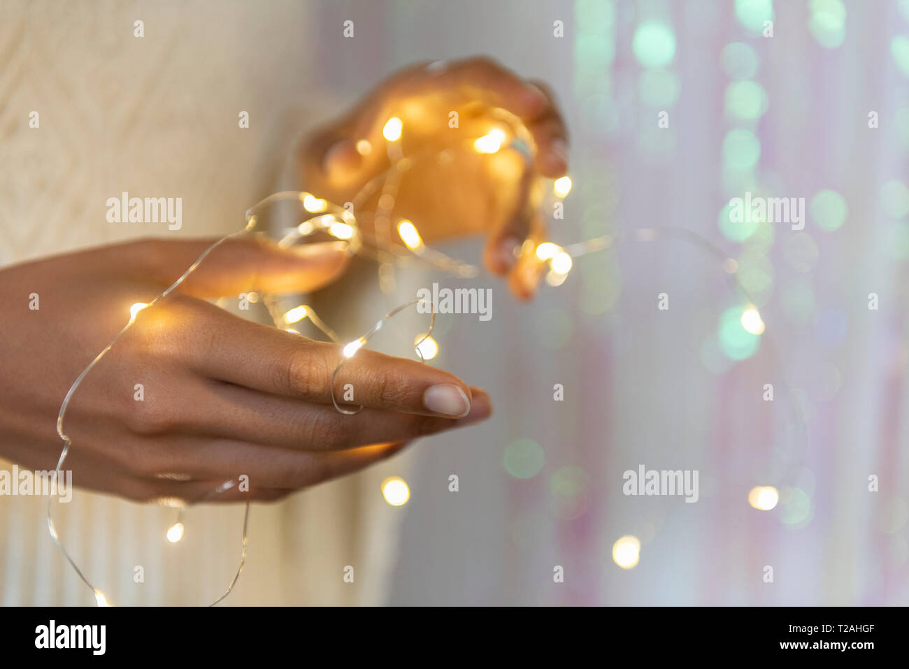 One woman fairy lights hi-res stock photography and images - Alamy