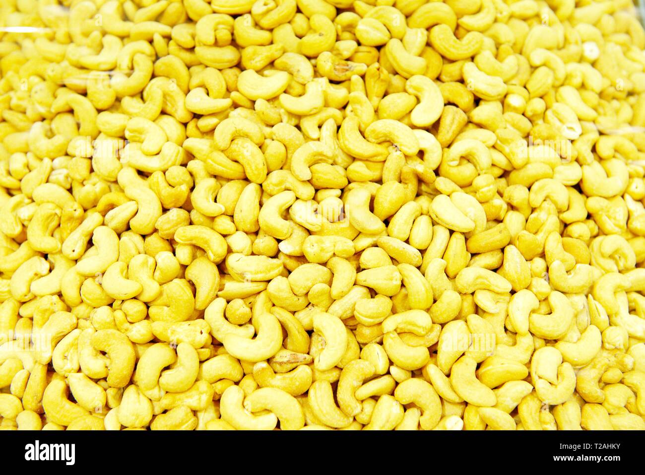 Nuts pattern backdrop. Cashew nuts on a shop shelf Stock Photo - Alamy