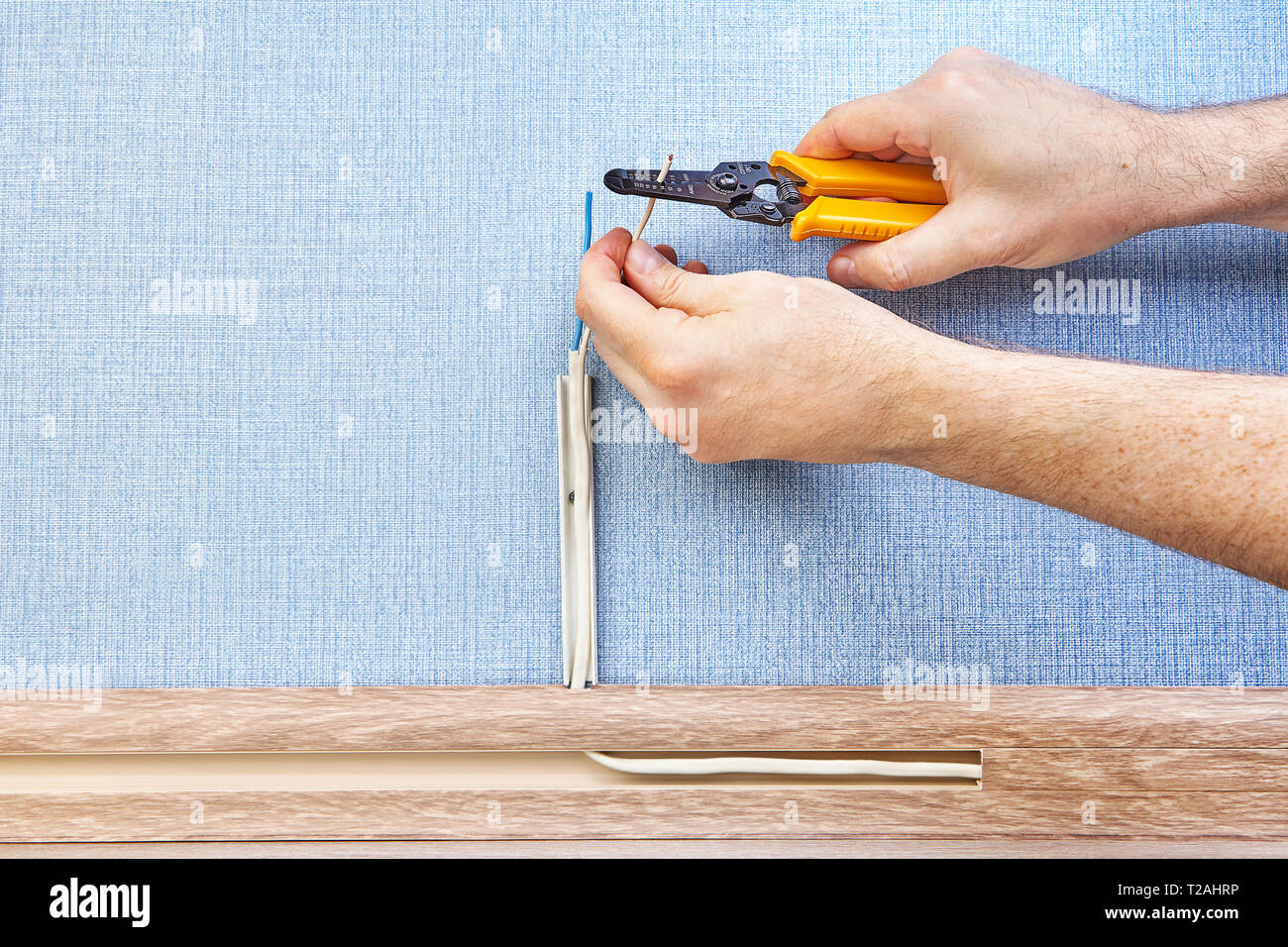 Electrical installation services, stripping wire is process of removing ...