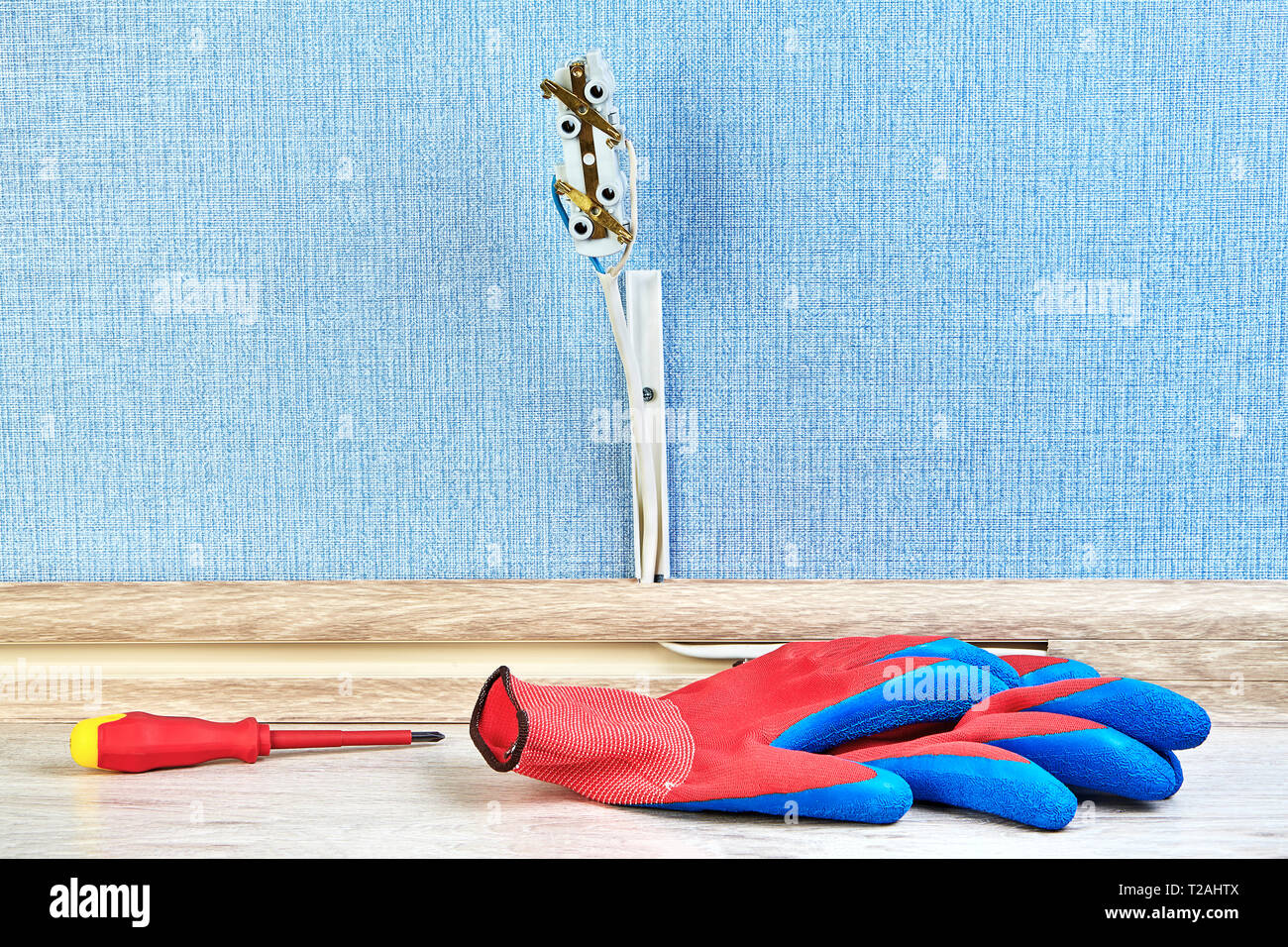 Electrical euro wall plug connected with cable channel of floor plinth ...