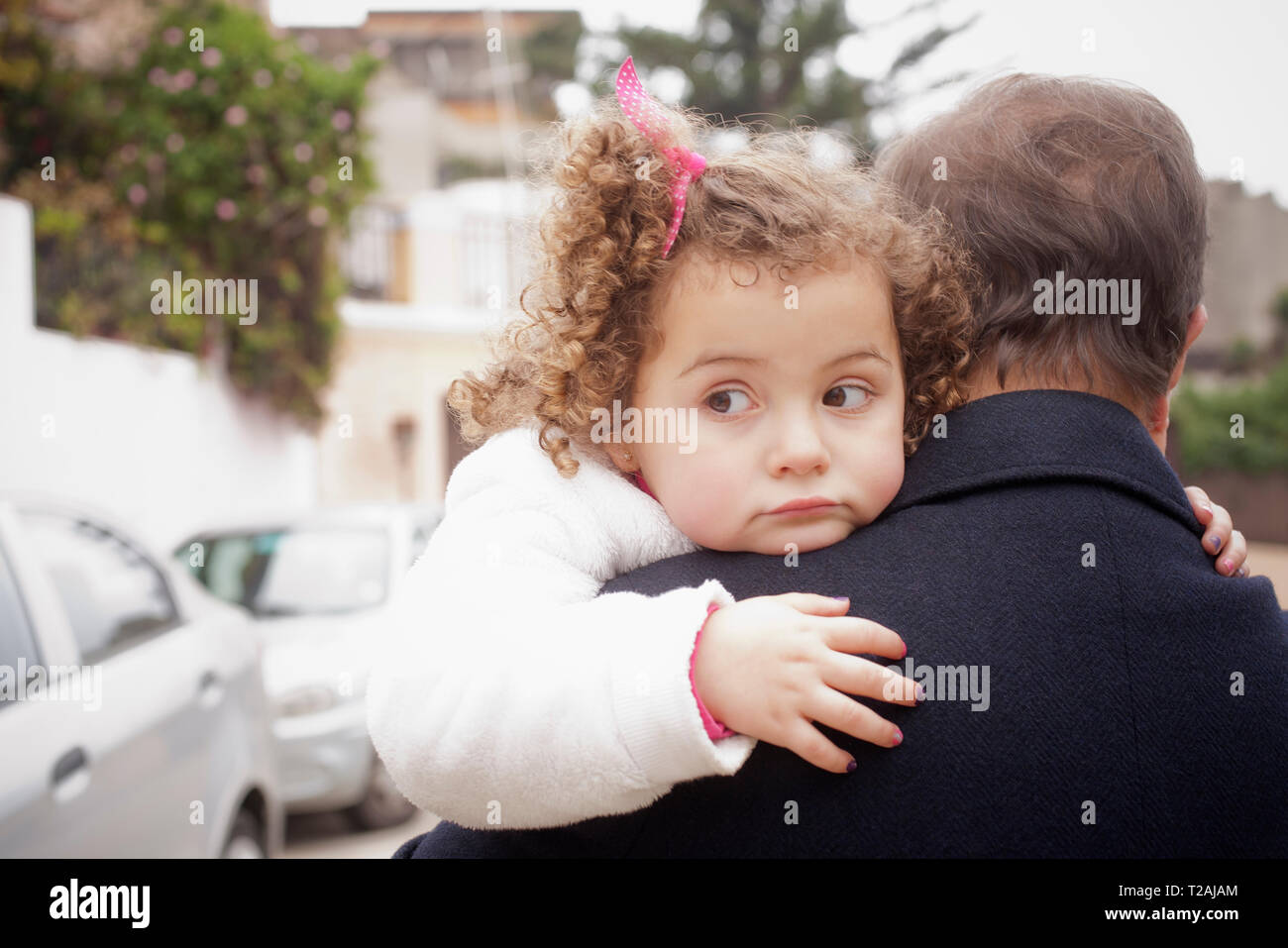 Girl being carried by her father Stock Photo - Alamy