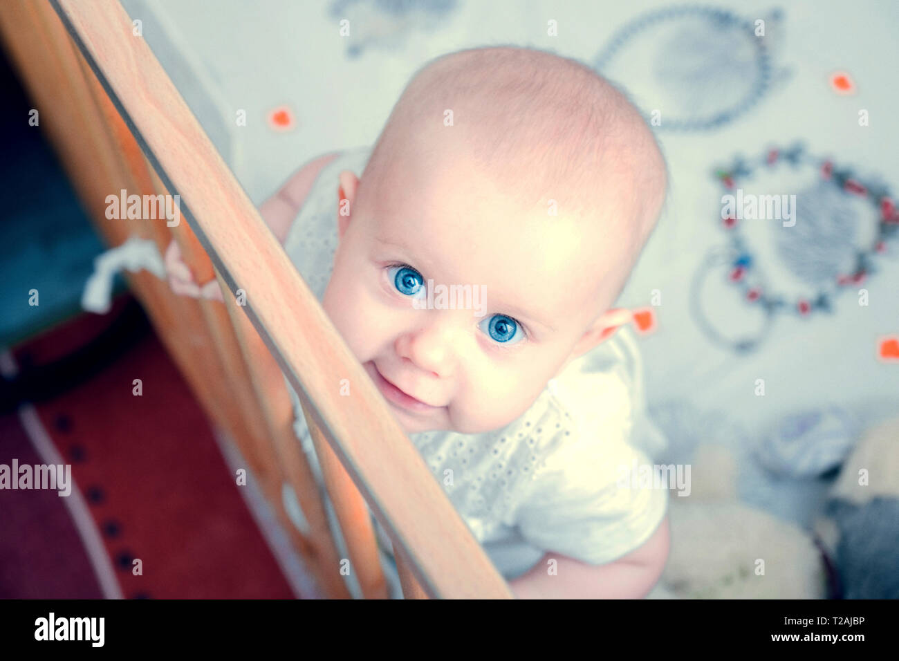 Baby in crib hi-res stock photography and images - Alamy