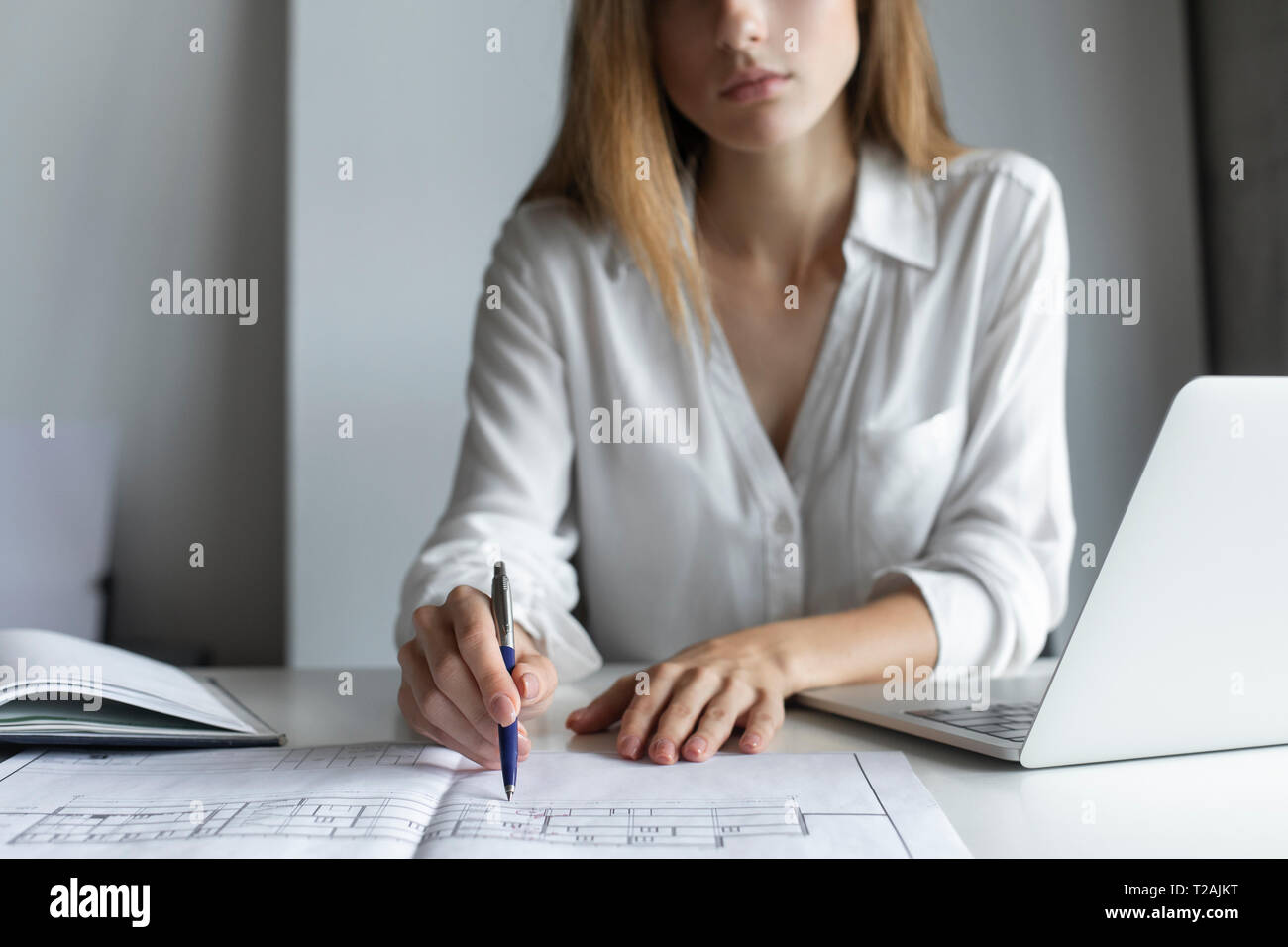 Business people working on blueprints hi-res stock photography and ...