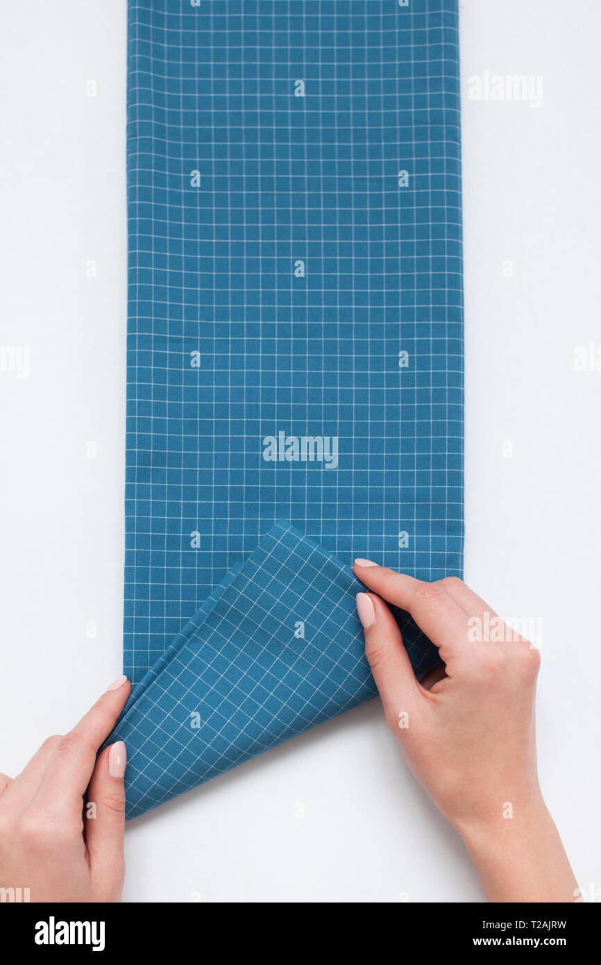 Young woman folding hands hi-res stock photography and images - Alamy