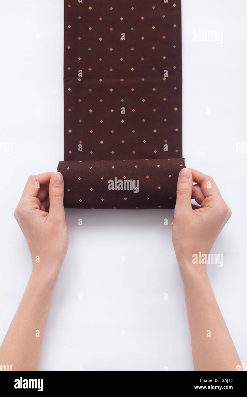 Young woman folding hands hi-res stock photography and images - Alamy