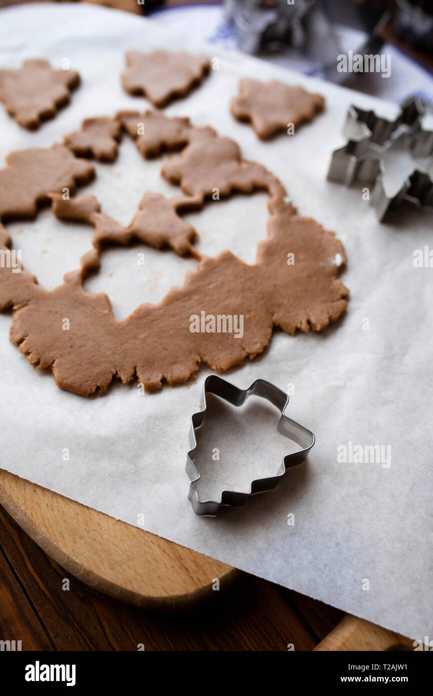 Cookie dough with cut out shapes Stock Photo - Alamy