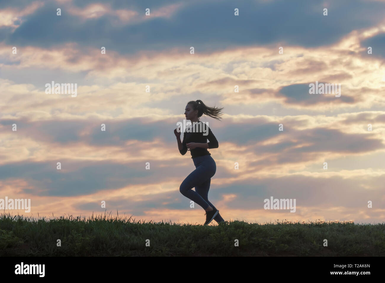 Running woman morning workout. Female Runner. Jogging during sunrise ...