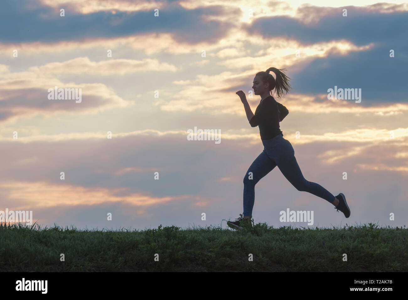 Running woman morning workout. Female Runner. Jogging during sunrise ...