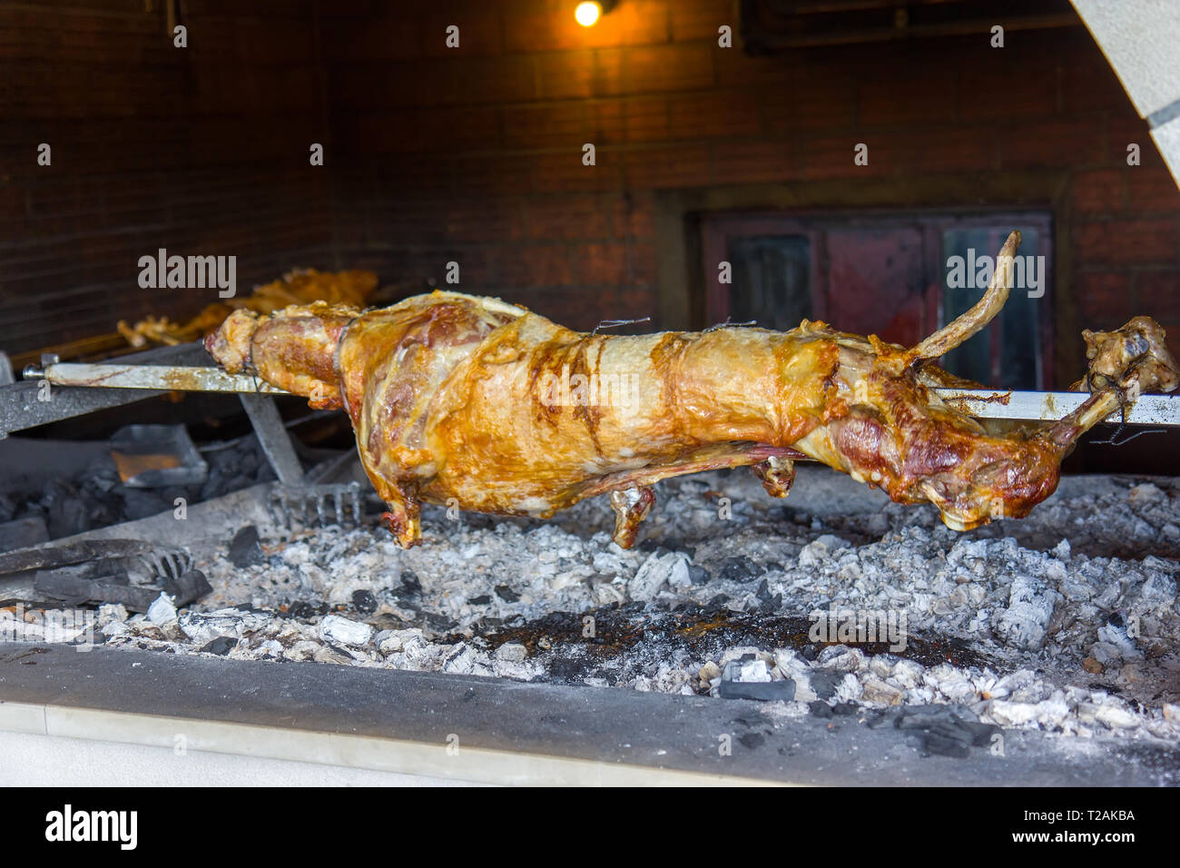 Spit roast lamb hi-res stock photography and images - Alamy