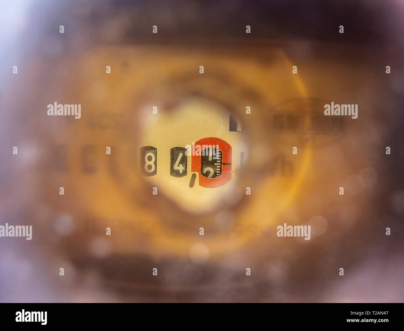 electricity meter seen through a hole Stock Photo - Alamy