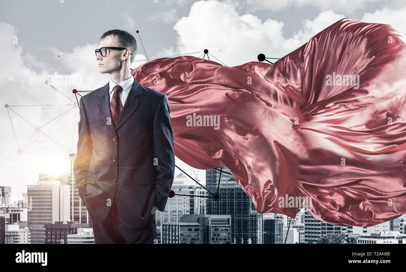 Concept of power and sucess with businessman superhero in big city ...