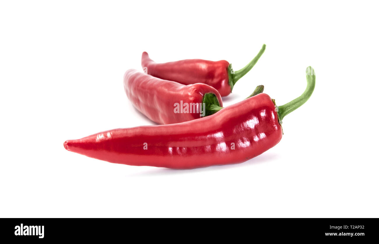 Group of tree Red chili peppers isolated on a white background Stock ...