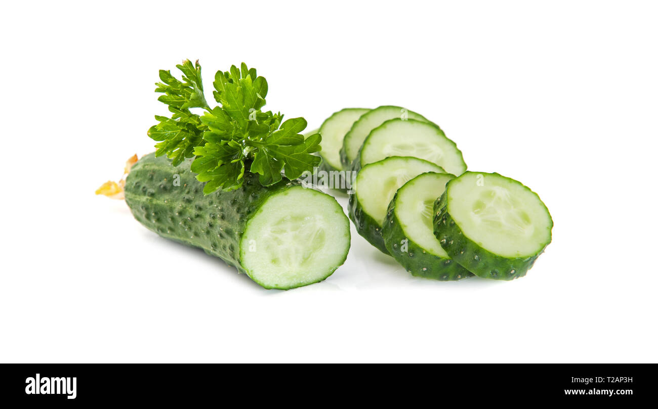 Fresh Cucumber whole and sliced isolated on a white background Stock ...