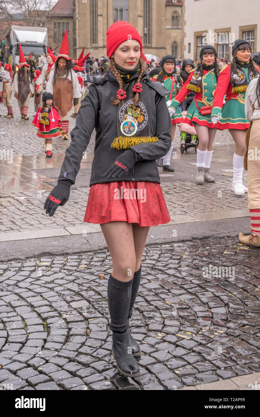 STUTTGART, GERMANY - MARCH 5: nice young majorette marching in parade ...