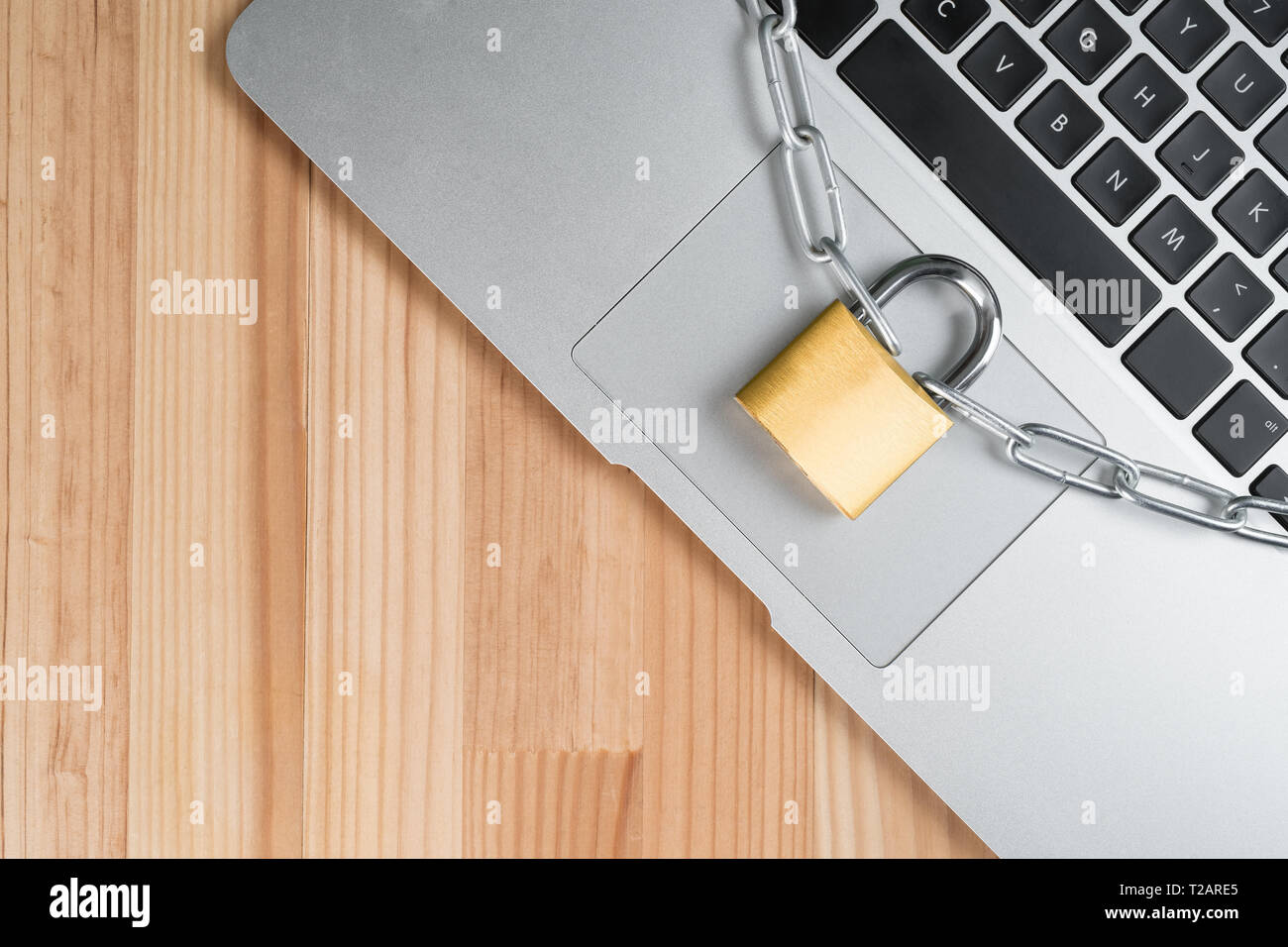 Padlock with chain on a laptop computer keyboard. Cyber security ...