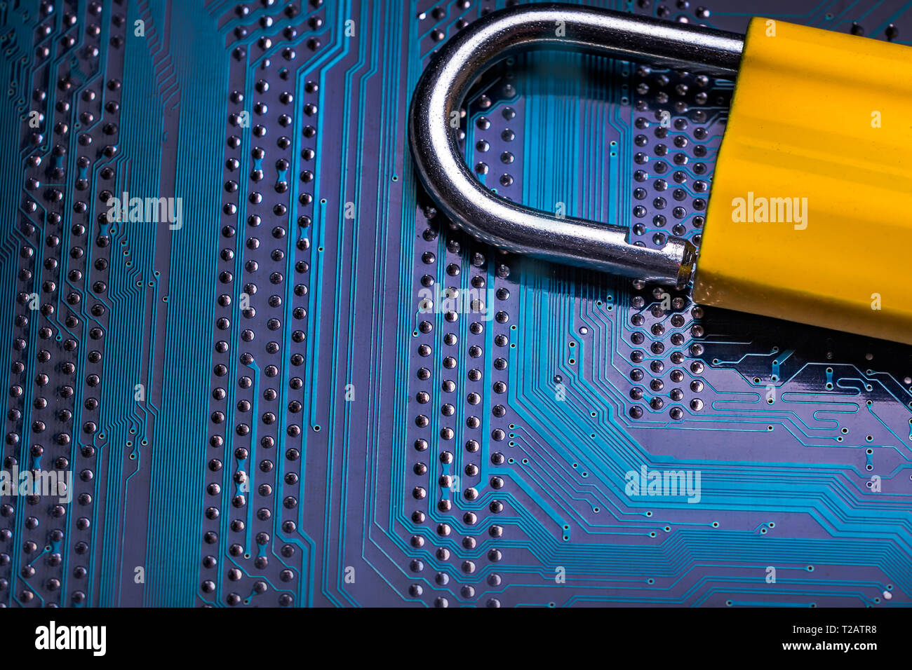 Background image of metal lock on a microchip Stock Photo - Alamy