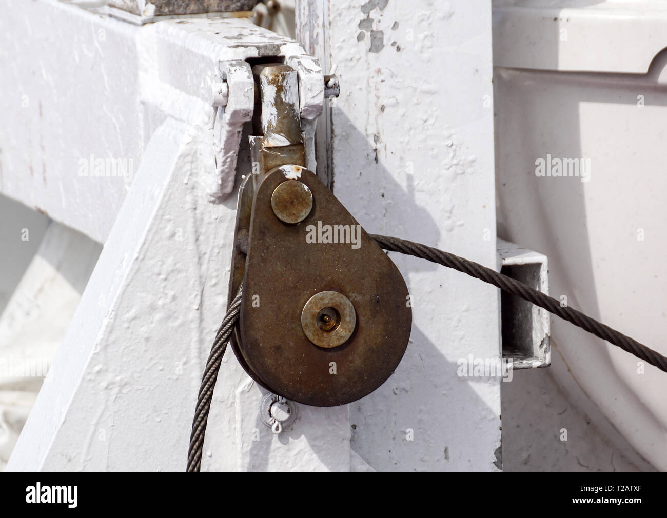 Pulley and rope on a boat. Small detail Stock Photo - Alamy